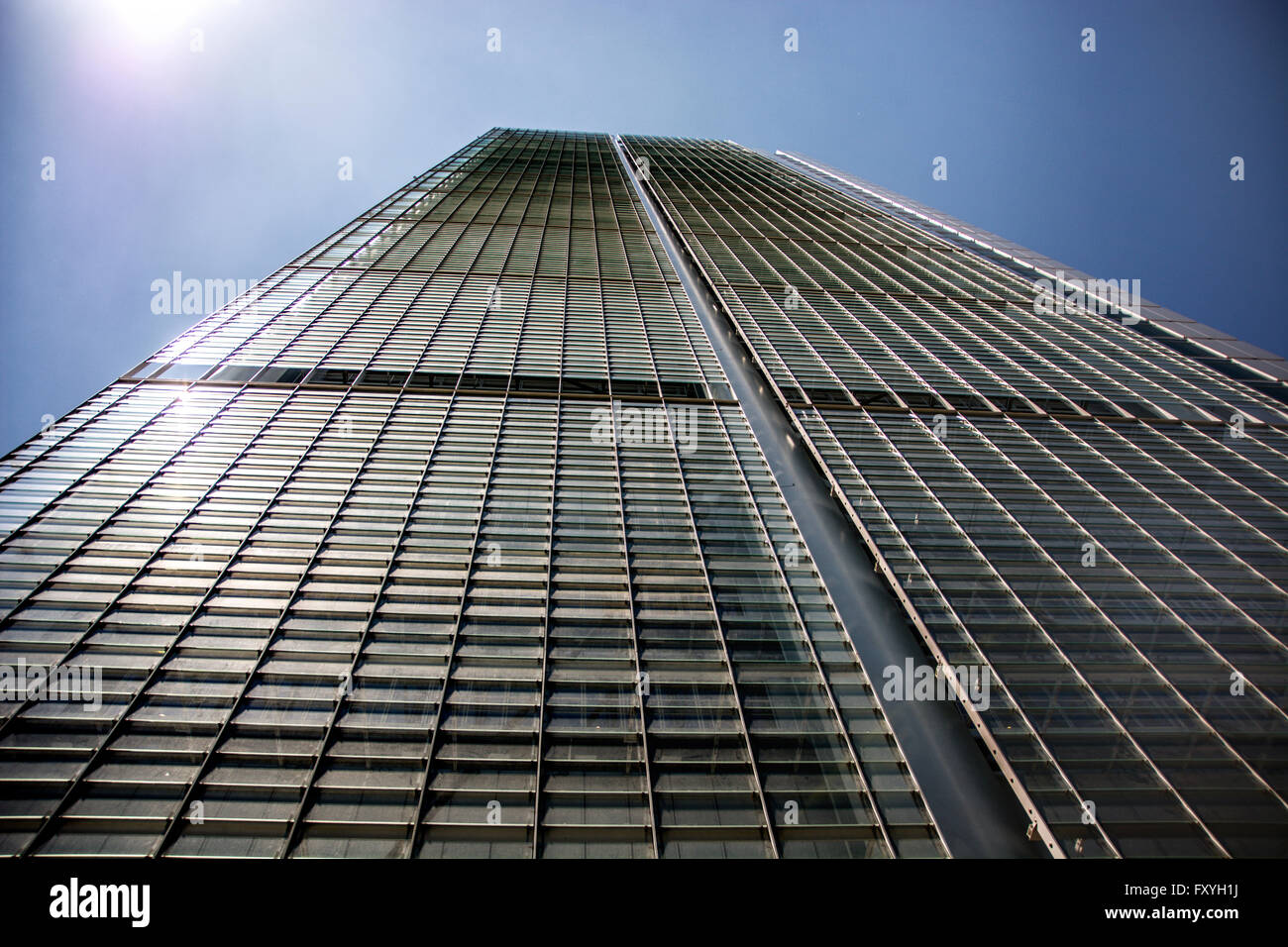 Modern building from below against of blue sky Stock Photo - Alamy