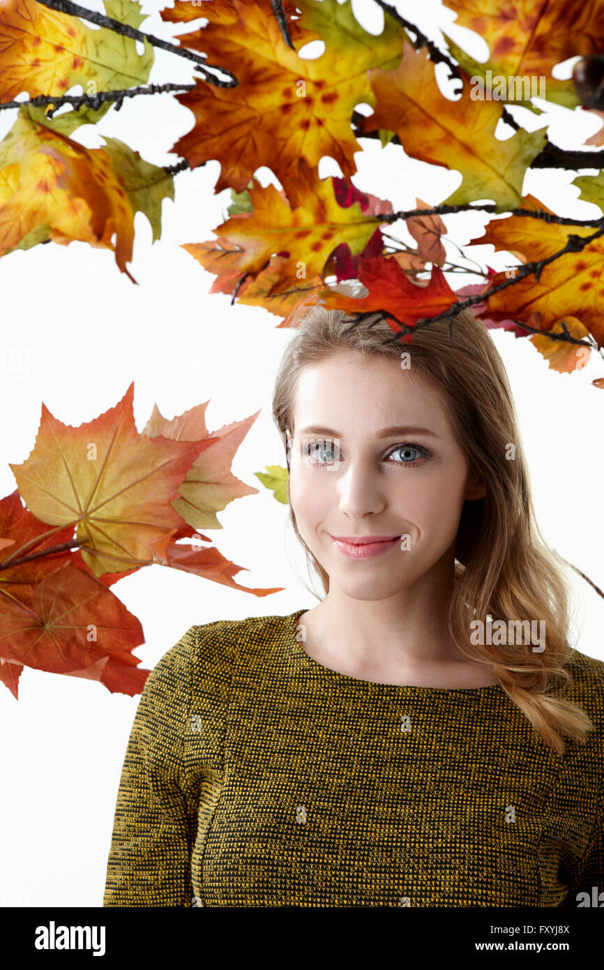 Woman with maple tree Stock Photo - Alamy