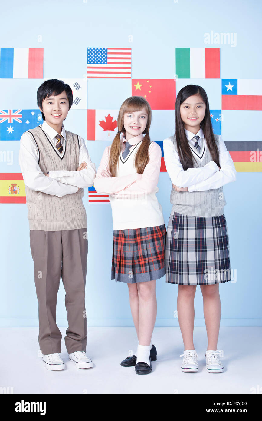 Front view asian schoolboy standing hi-res stock photography and images ...