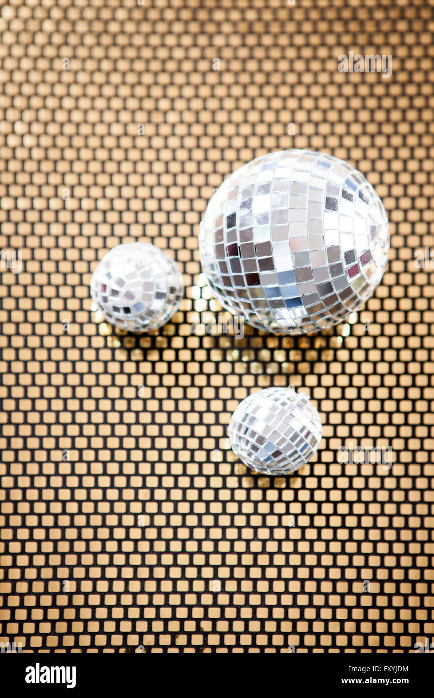 Mirror balls on texture Stock Photo - Alamy