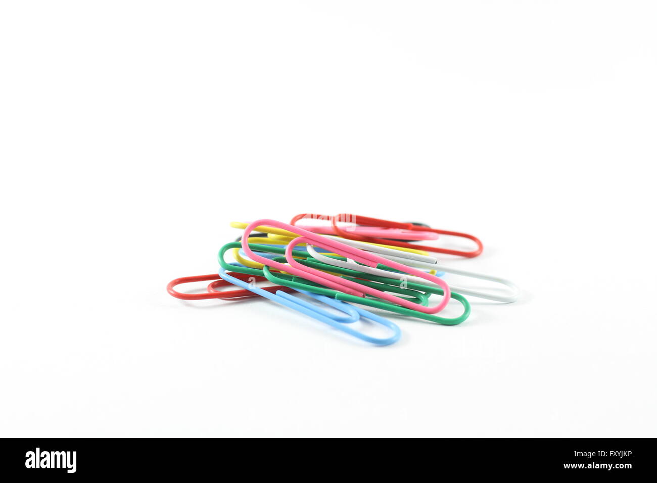 Several paper clips with rainbow colors Stock Photo - Alamy