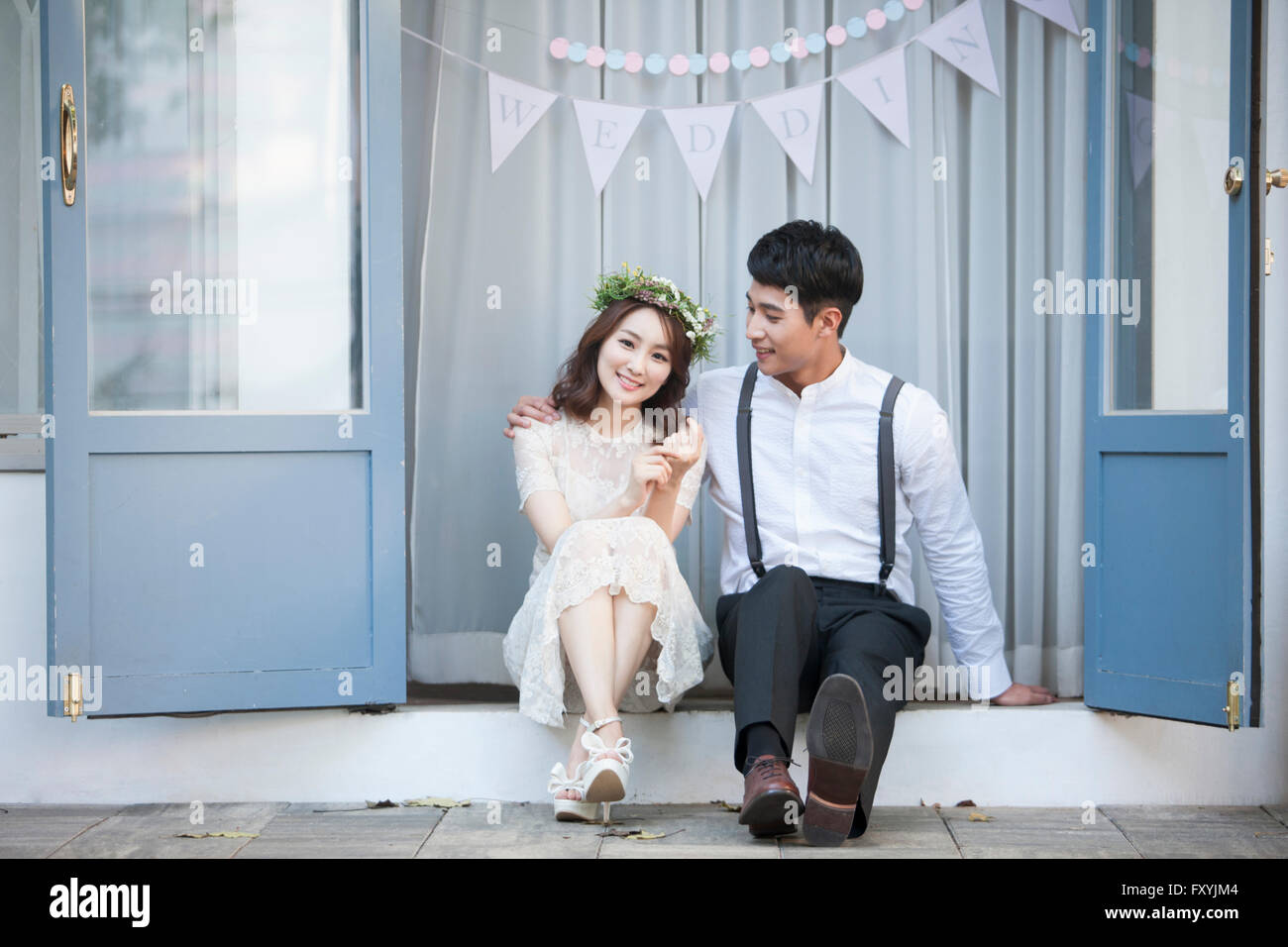 Sitting on threshold hi-res stock photography and images - Alamy