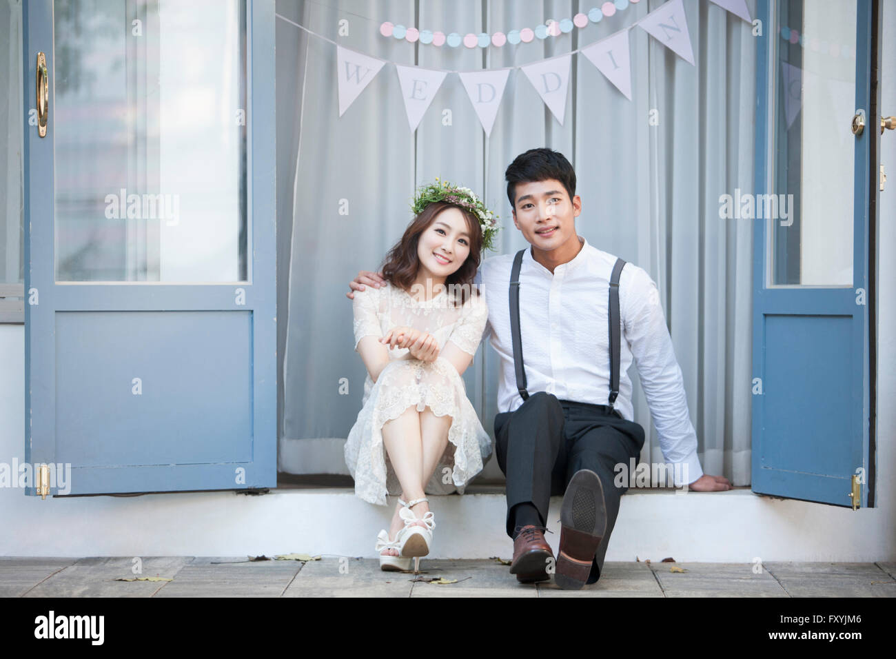 Sitting on threshold hi-res stock photography and images - Alamy