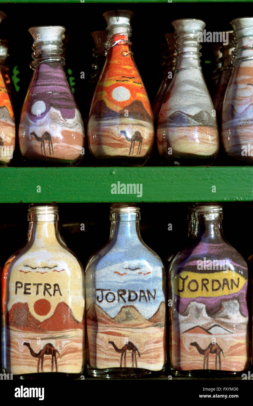 Sand-filled bottles to sell as souvenirs, Petra, Jordan. Colorful ...