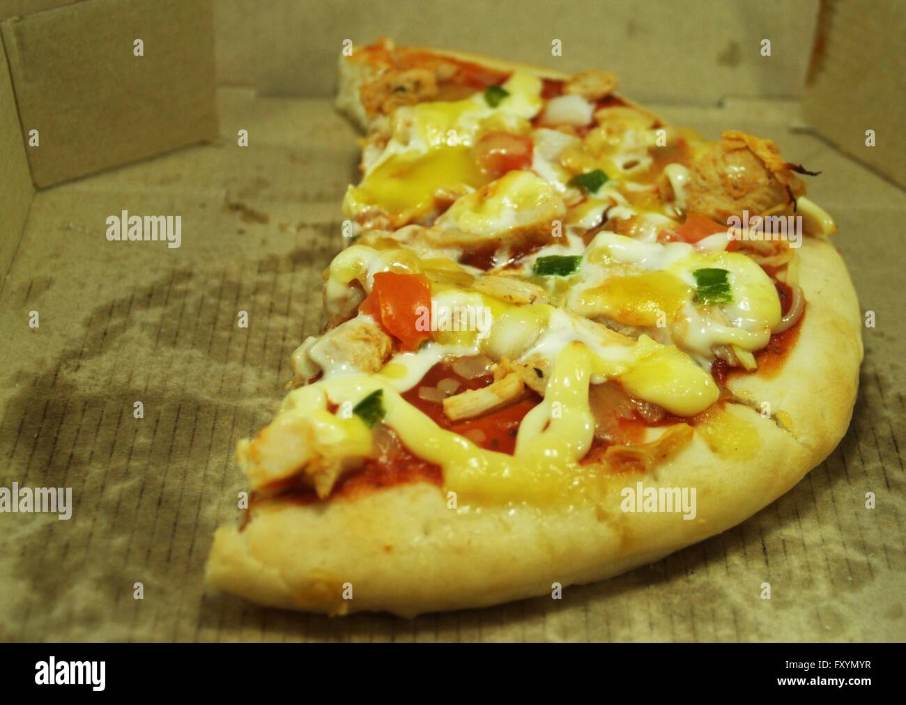 Cut off slice pizza Stock Photo - Alamy