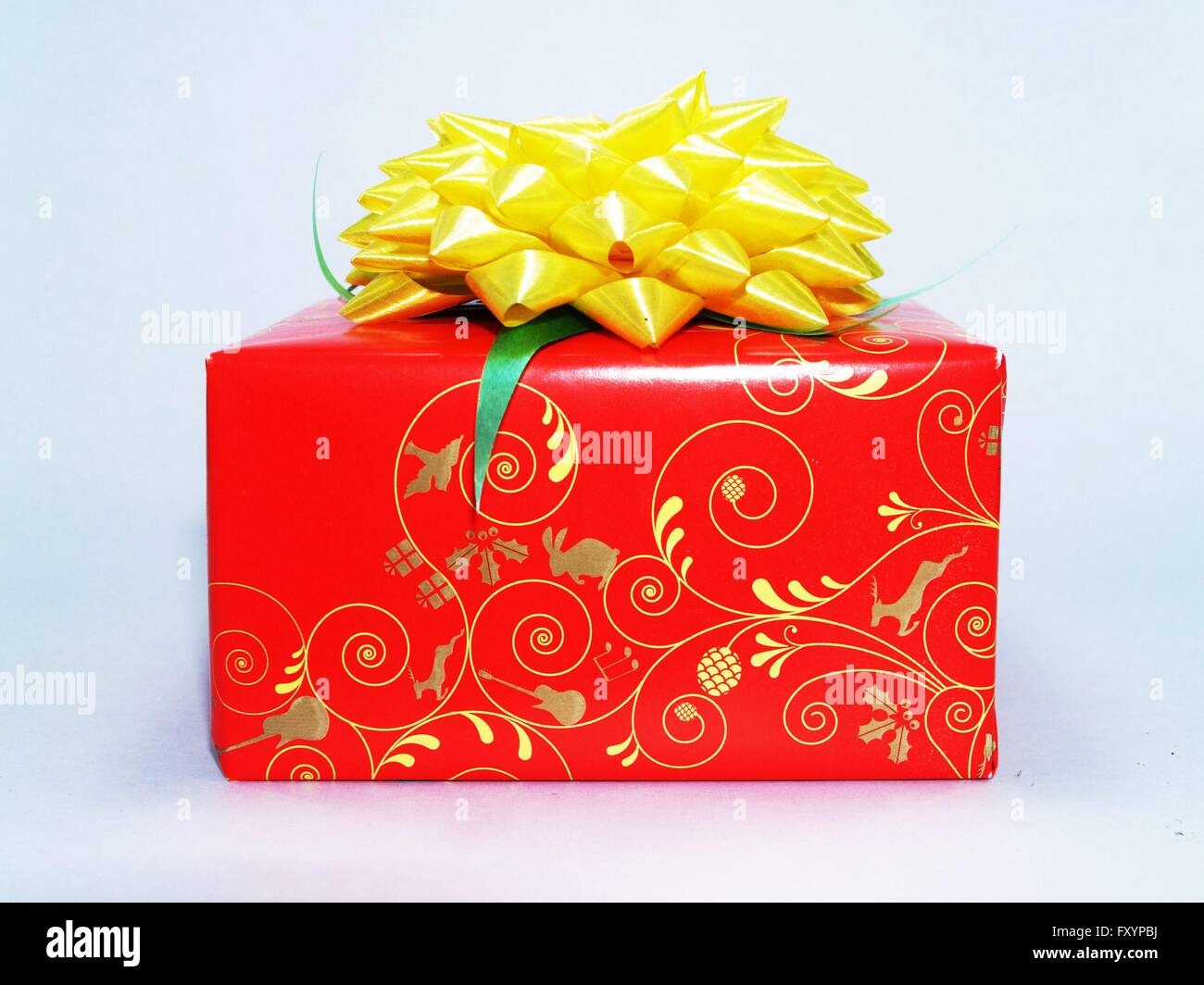 Red gift box with white ribbon isolated Stock Photo - Alamy