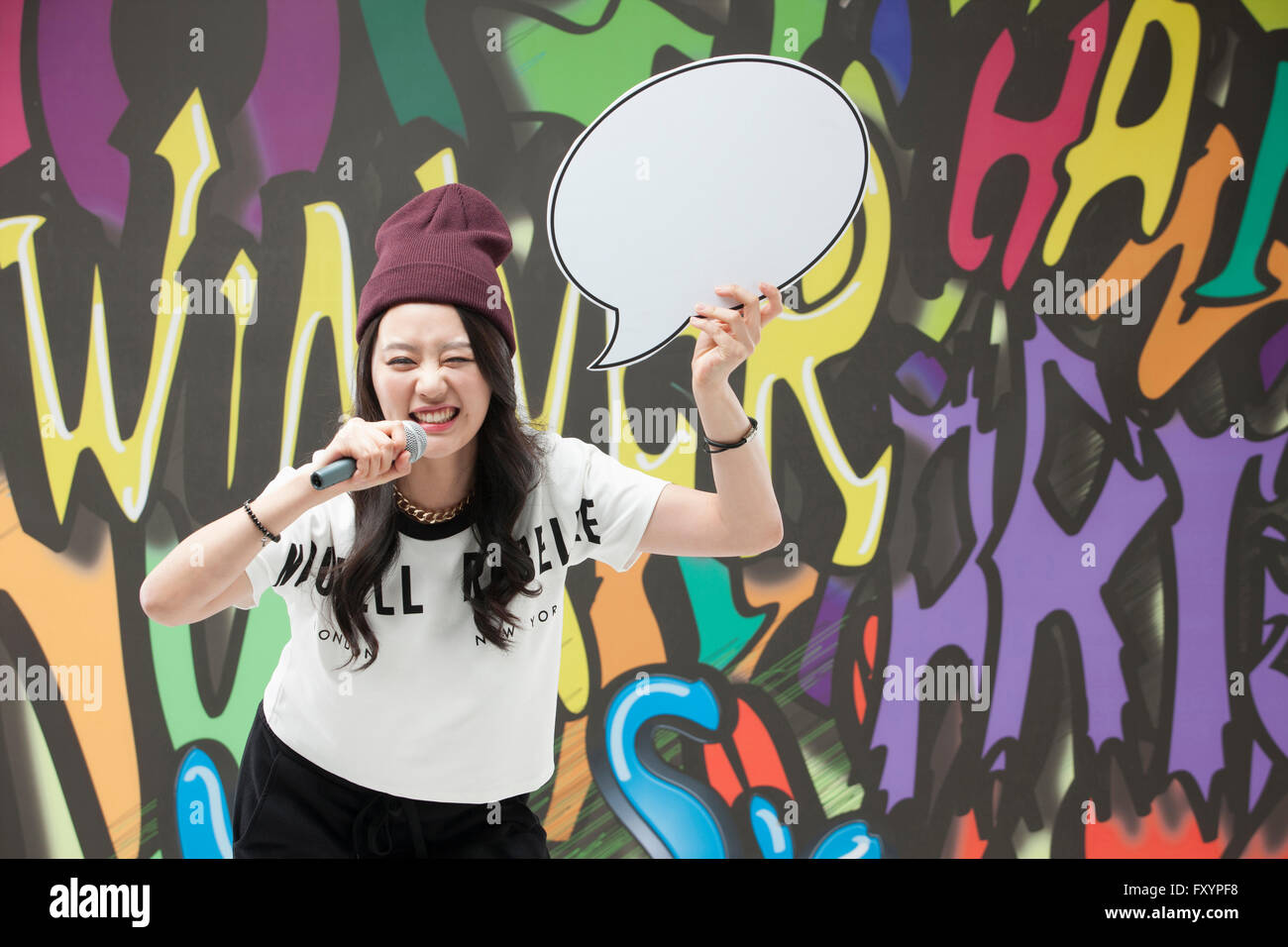 Woman winking and smiling hi-res stock photography and images - Alamy