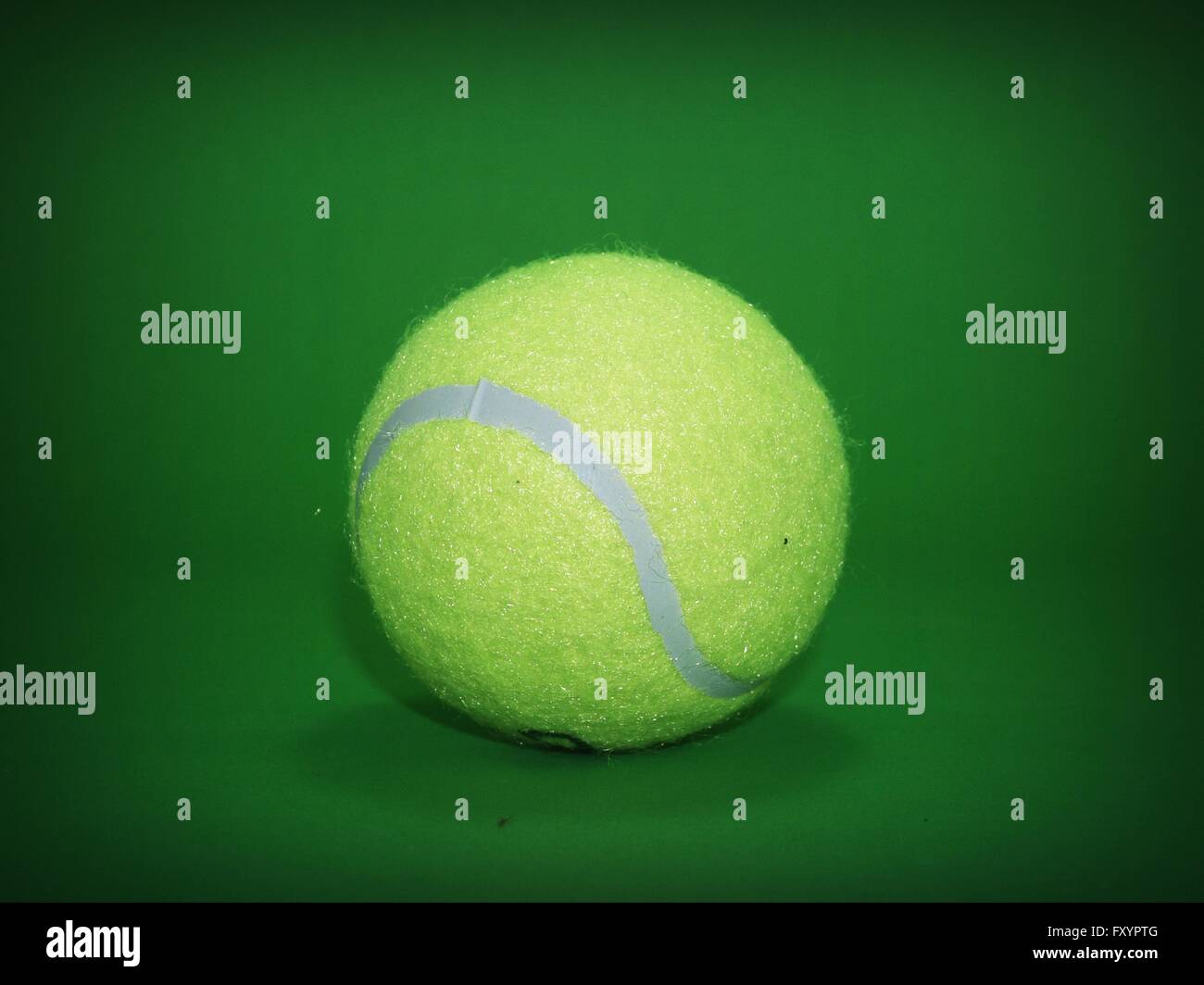 Single tennis ball Stock Photo - Alamy