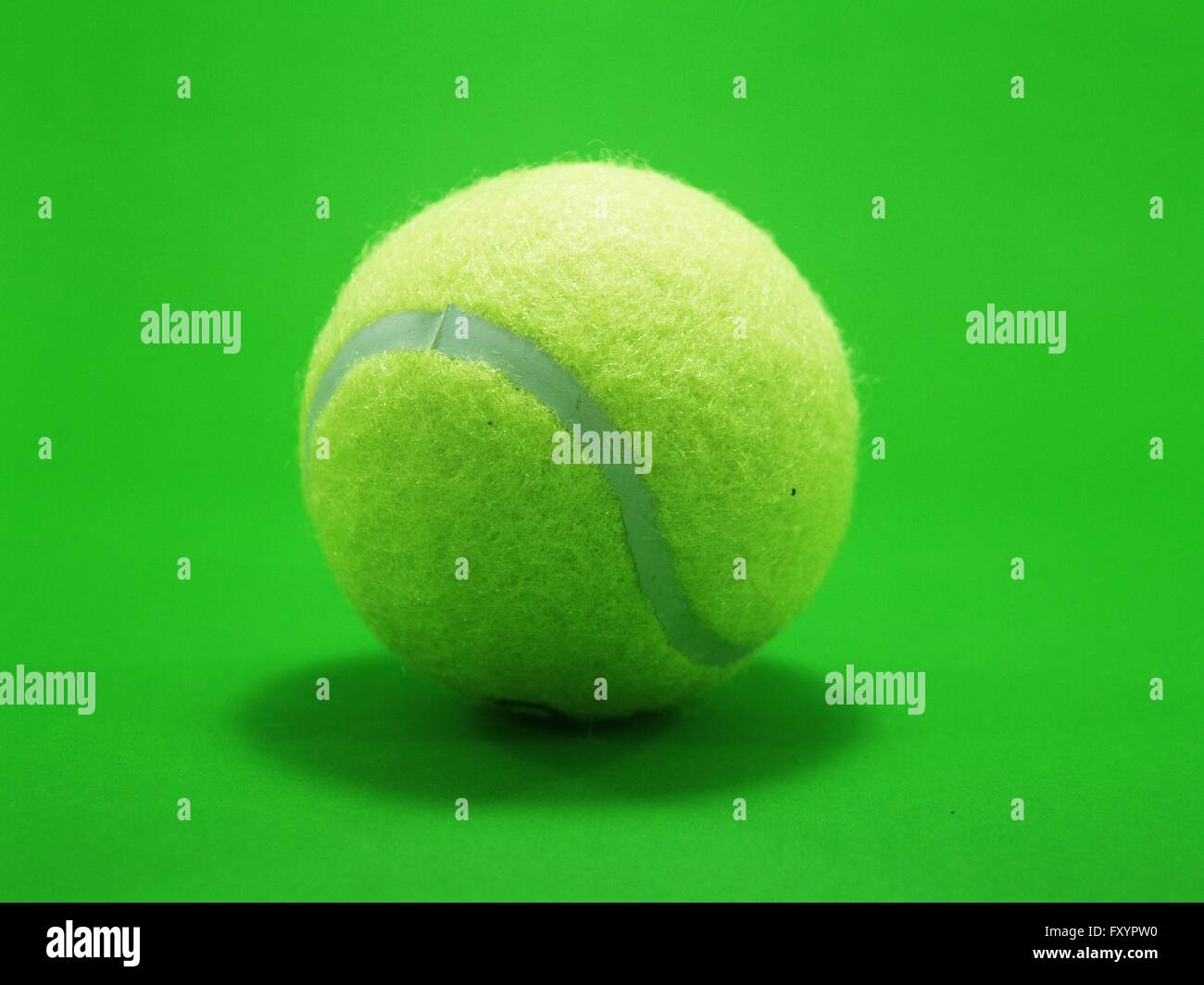 Single tennis ball Stock Photo - Alamy