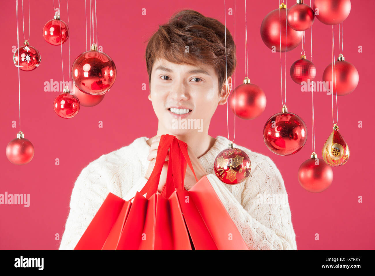Man shopping bags smiling hi-res stock photography and images - Alamy