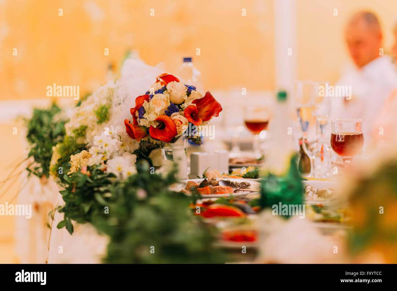 Table luxury setted for wedding celebration and decorated with flowers ...