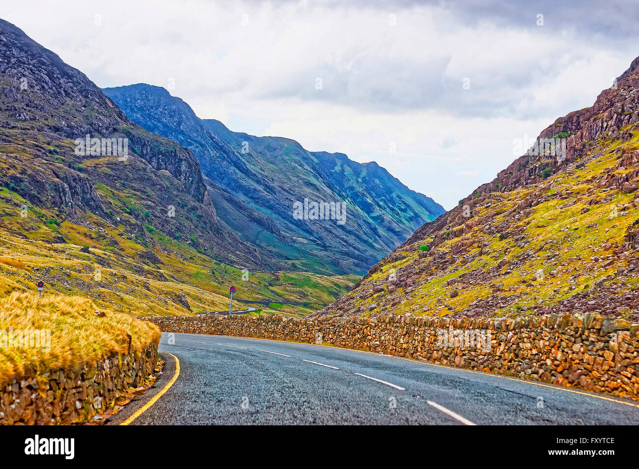 Road view to mountains in Snowdonia National Park in North Wales of the ...