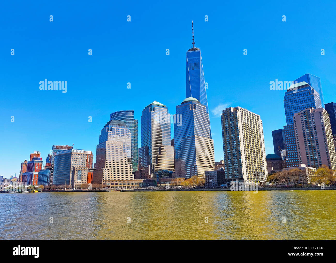 View from Ferry on Lower Manhattan from embankment. New York, USA ...