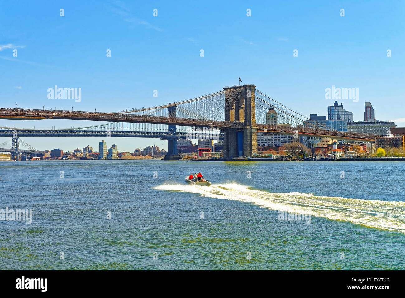 View from Ferry on Brooklyn bridge and Manhattan bridge above East ...