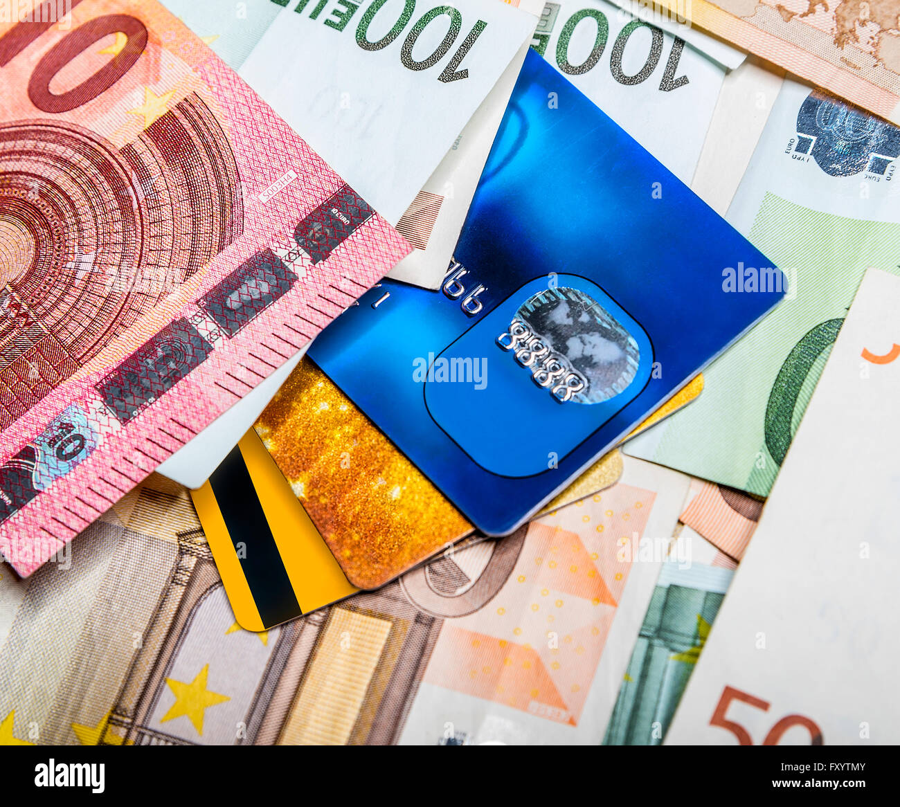 Different Euro bills and credit card background Stock Photo - Alamy