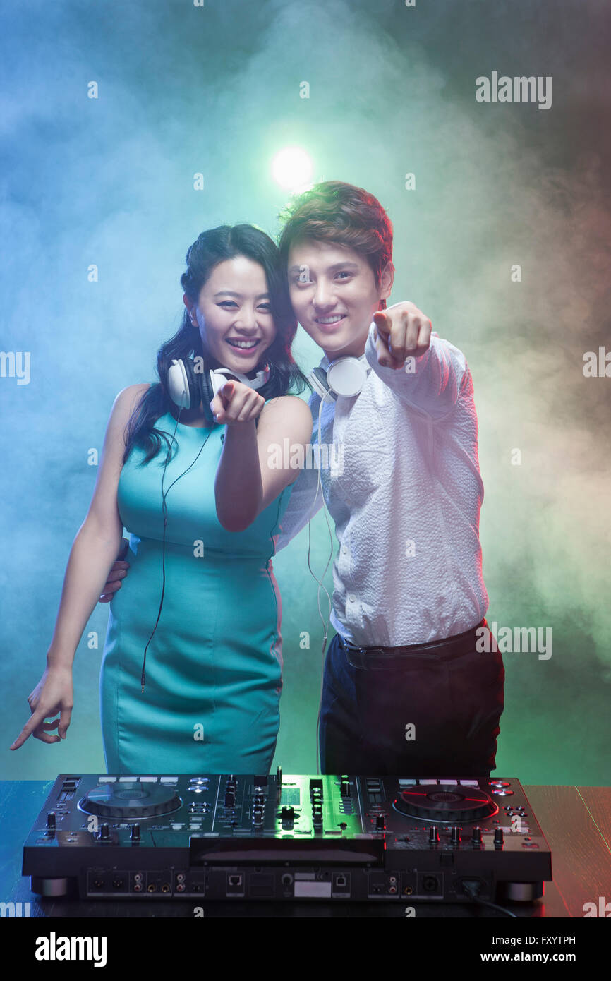Couple pointing at hi-res stock photography and images - Alamy