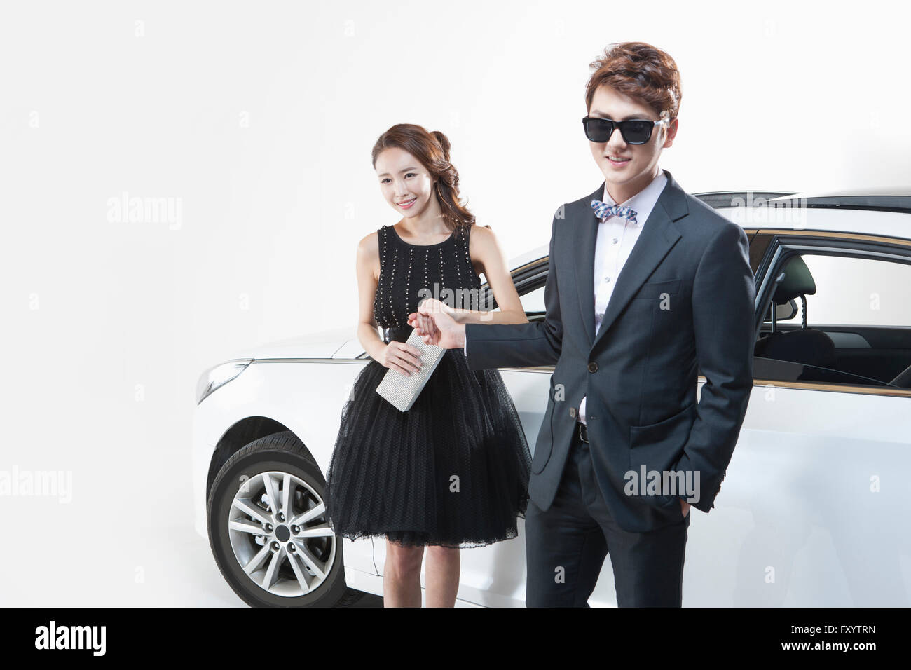 Standing smiling car transportation hi-res stock photography and images ...