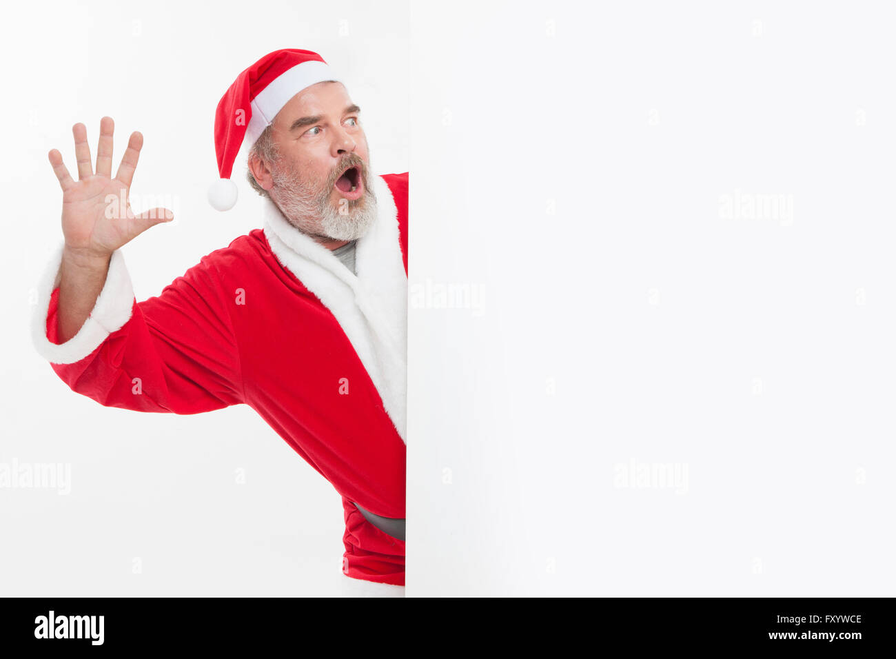 Portrait of surprised Santa Stock Photo - Alamy