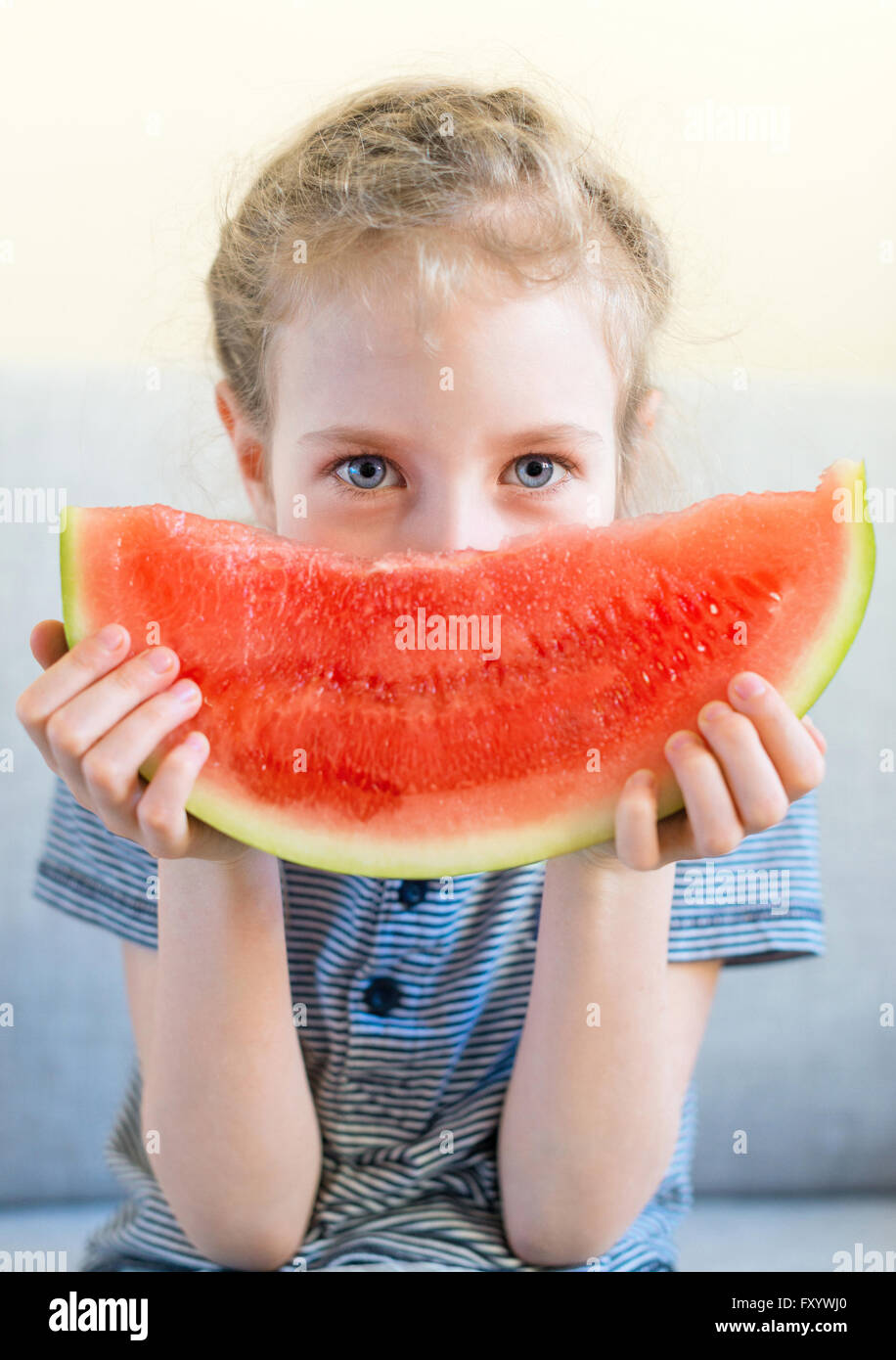 Little girl with slice of juicy watermelon Stock Photo - Alamy