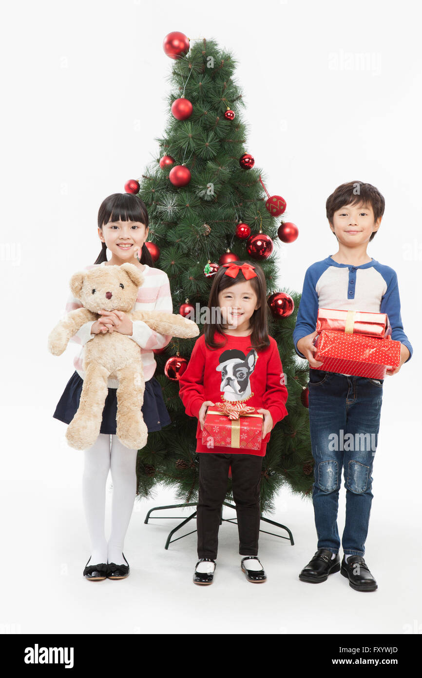 Children with presents hi-res stock photography and images - Alamy