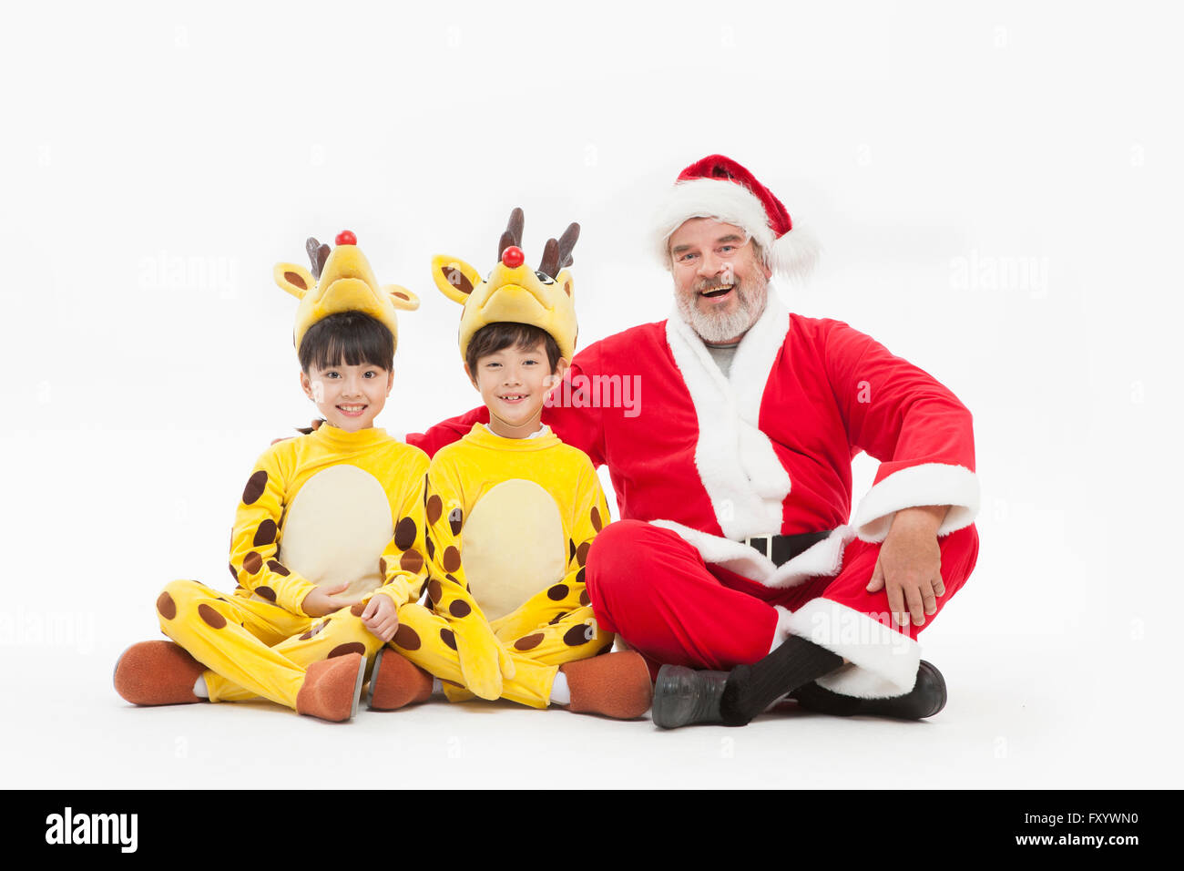 Santa sitting down hi-res stock photography and images - Alamy