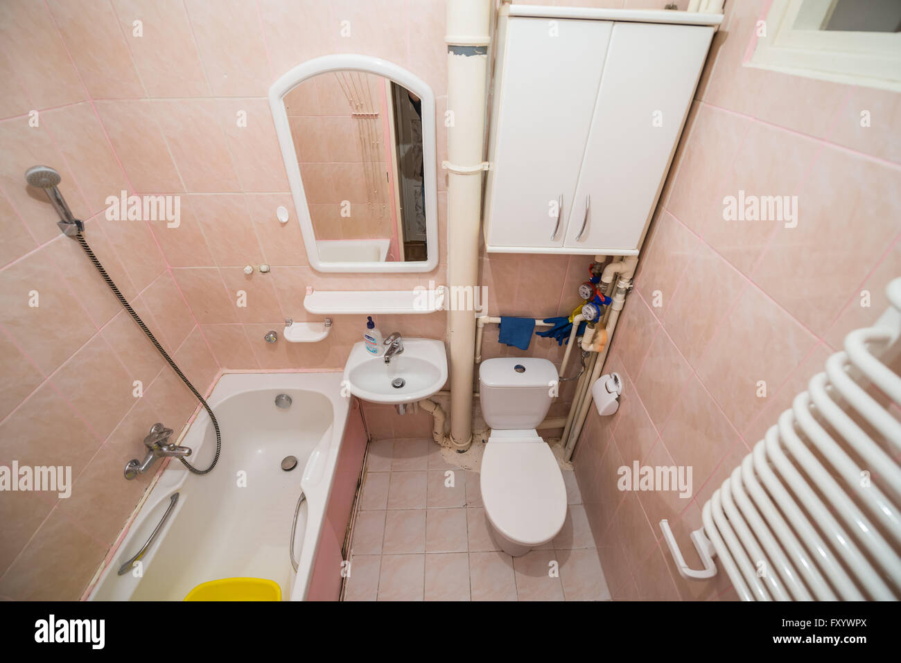Looking in bathroom cabinet hi-res stock photography and images - Alamy
