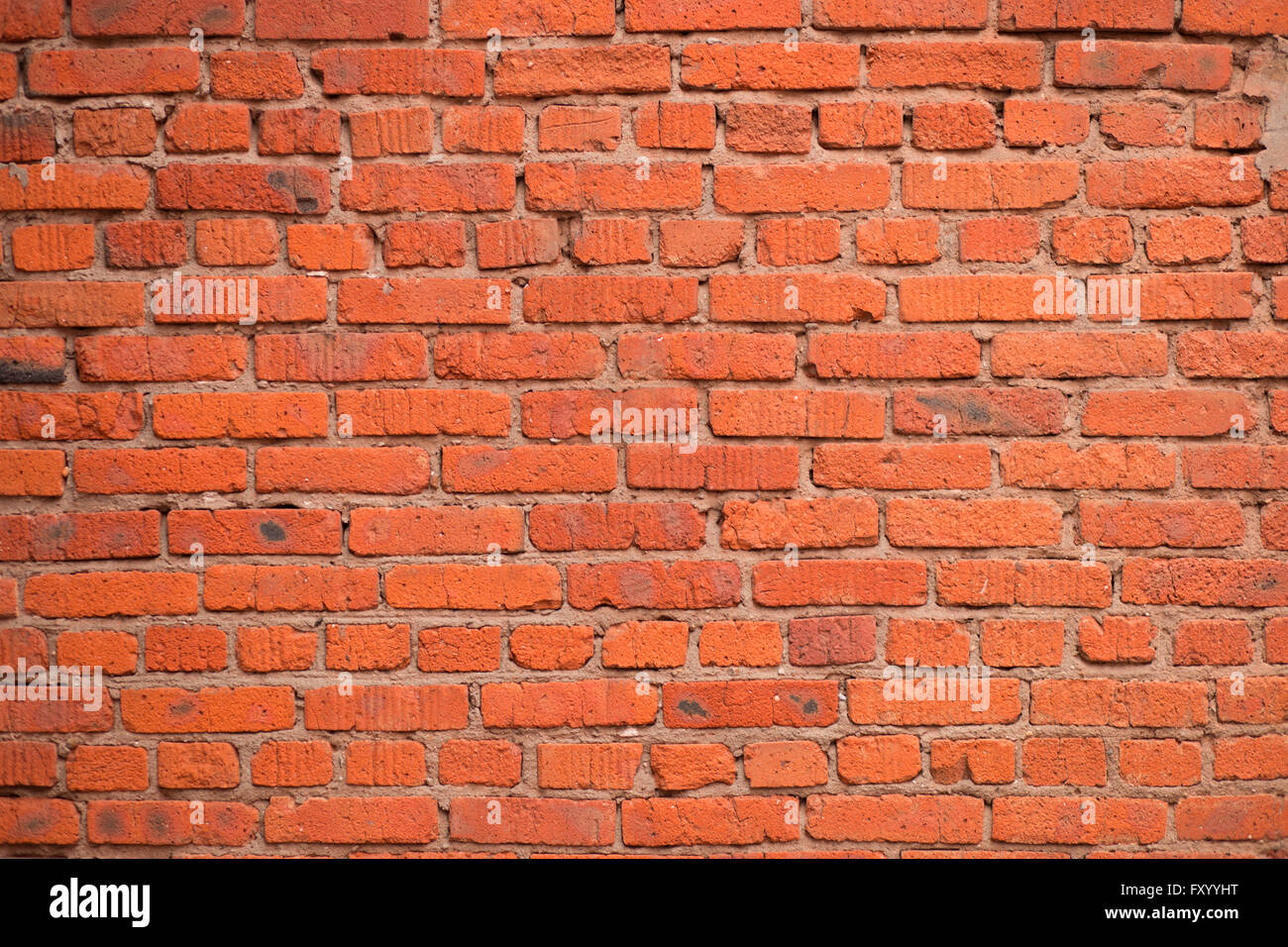 Red brick material wall outdoors texture background Stock Photo - Alamy