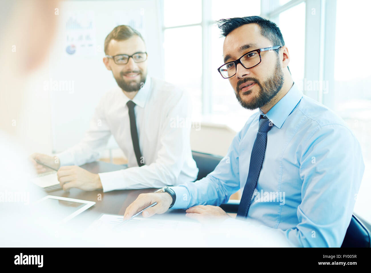 Talking to partner Stock Photo - Alamy