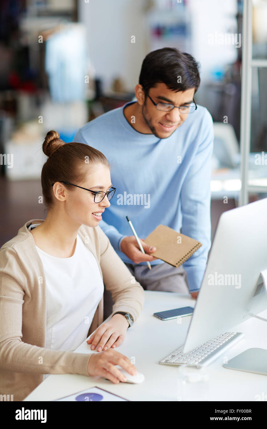 Colleagues at work Stock Photo - Alamy