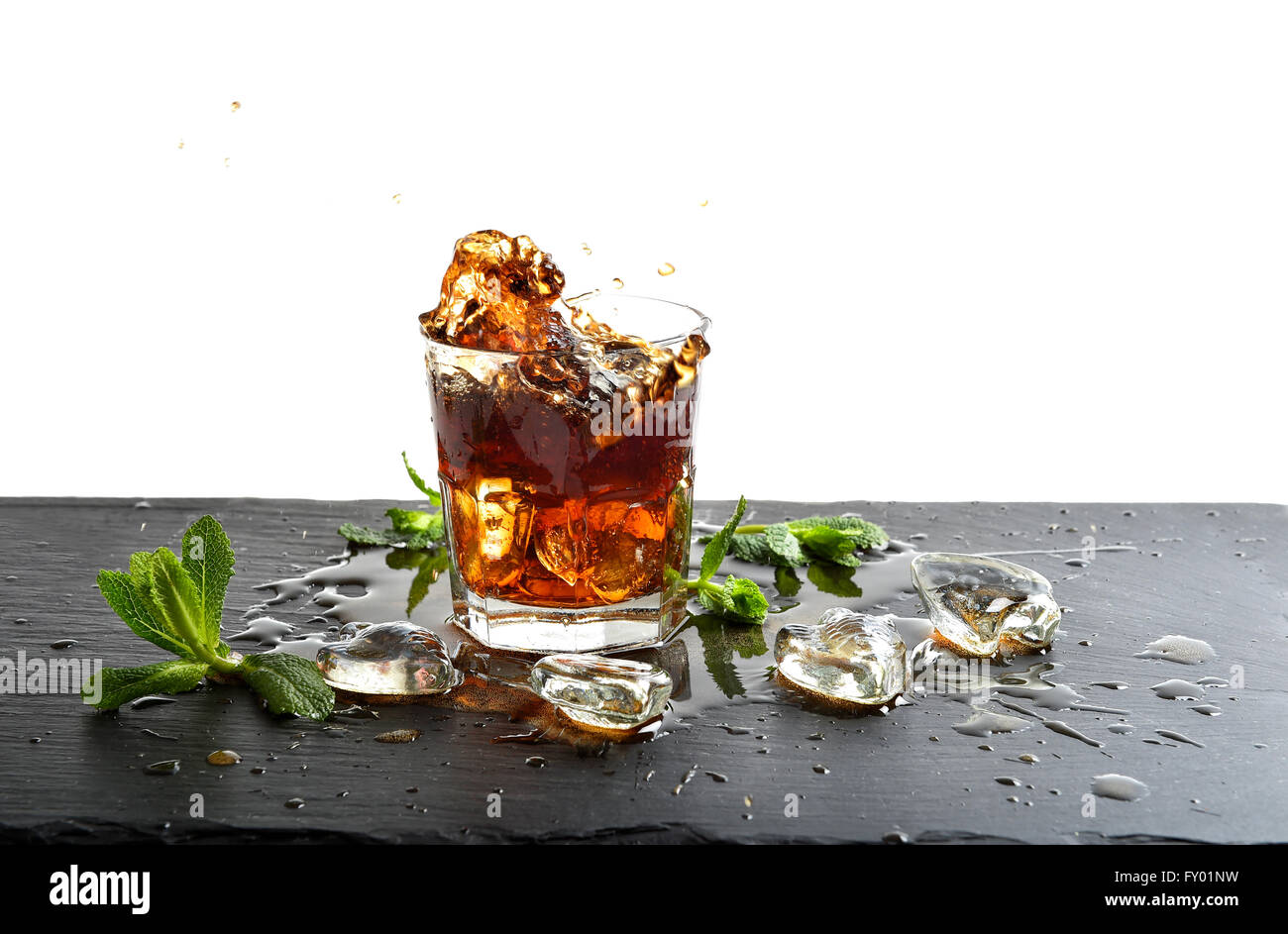 Alcohol glass splash hi-res stock photography and images - Alamy