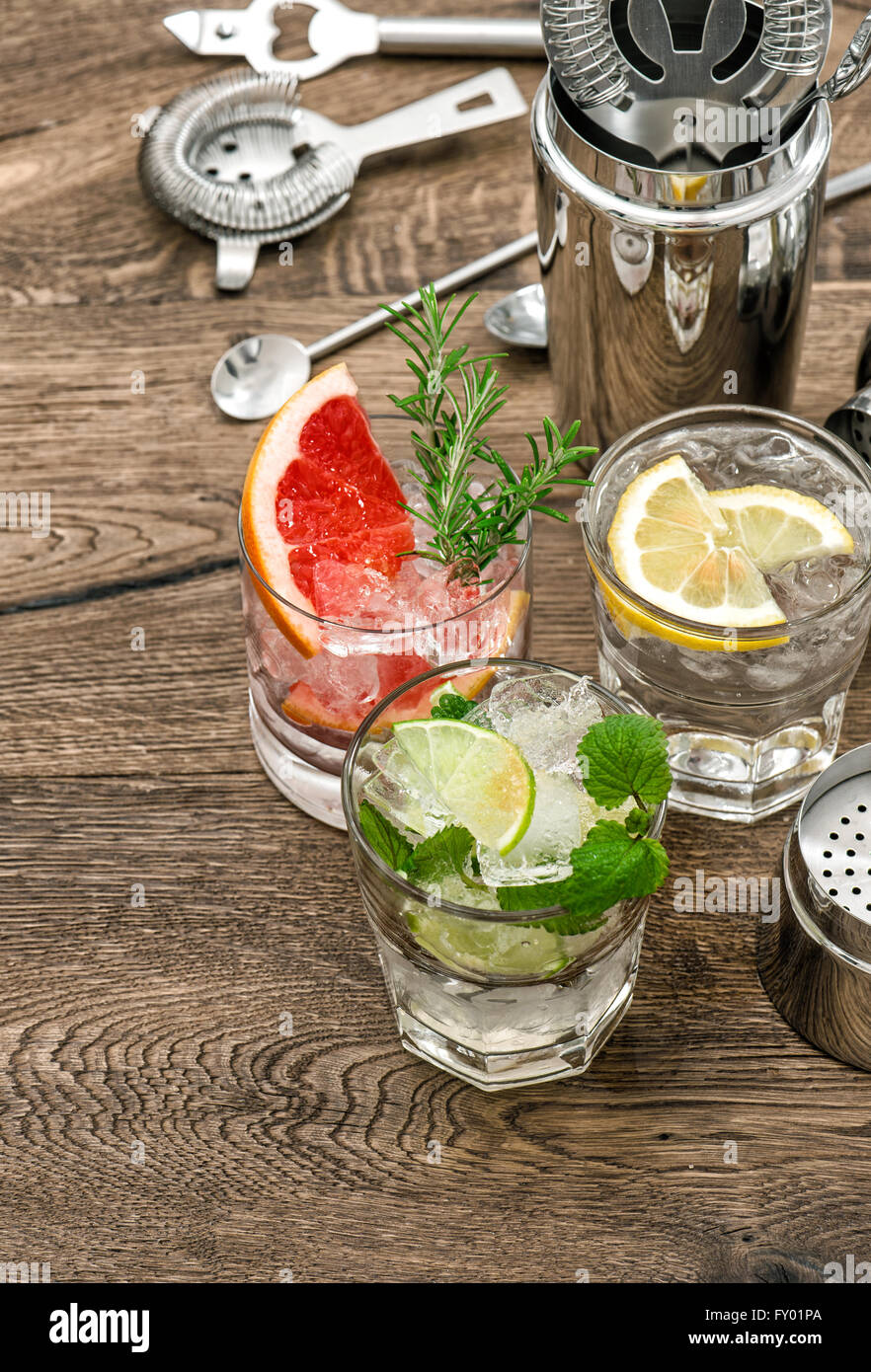 Cocktails with fruit decoration. Bar drink making tools. Food and ...