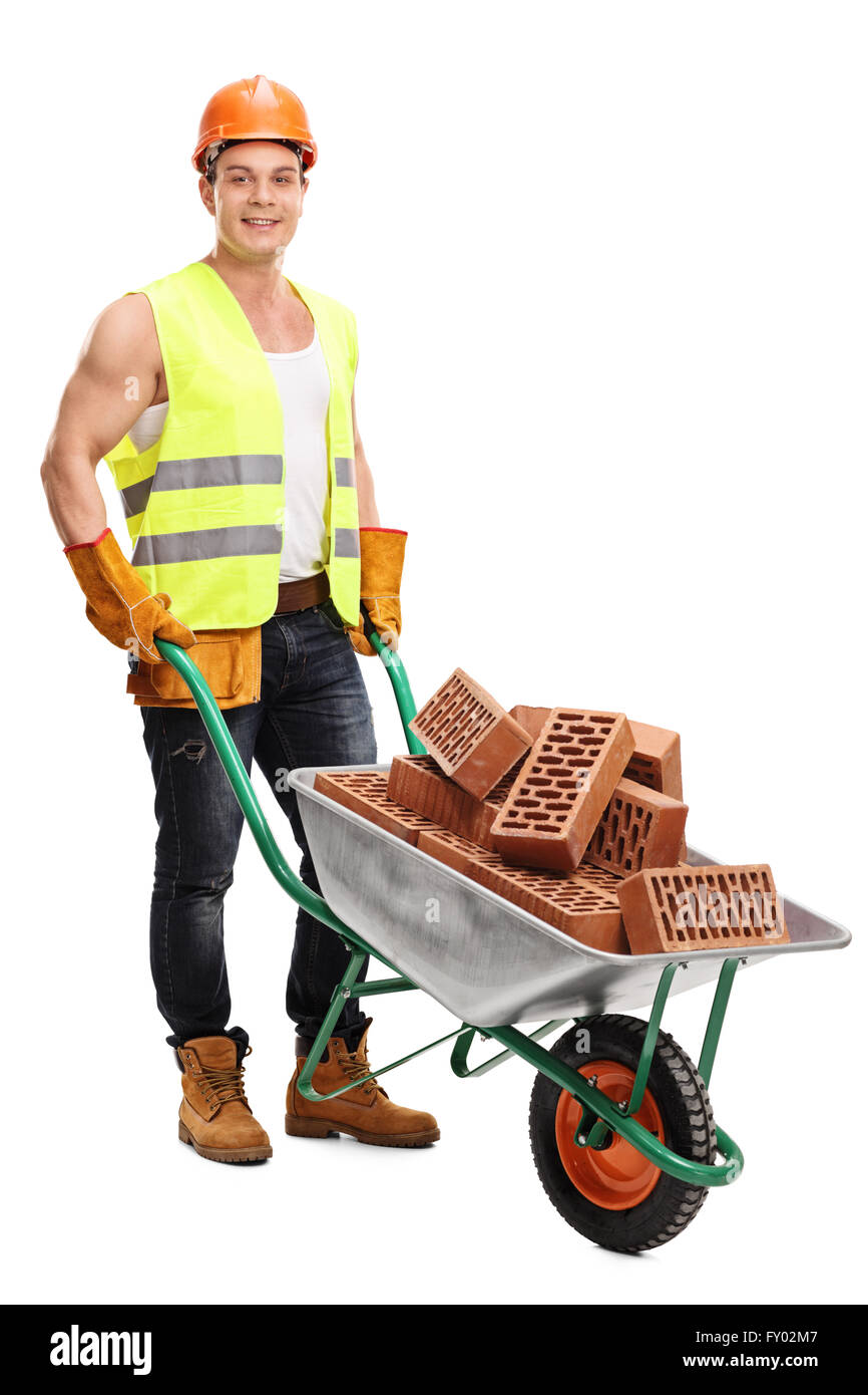 Full length portrait of a cheerful construction worker posing with a ...