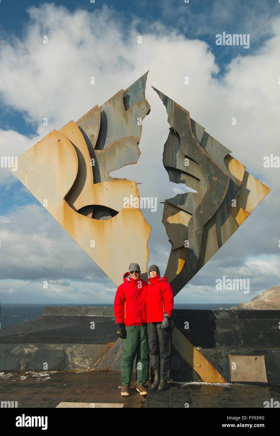 Tourists stand below Cape Horn Monument, Cape Horn, Chile Stock Photo ...