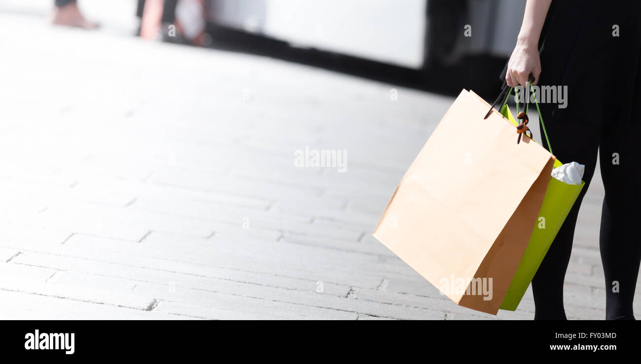 People shopping outdoor in the street, urban concepts Stock Photo - Alamy