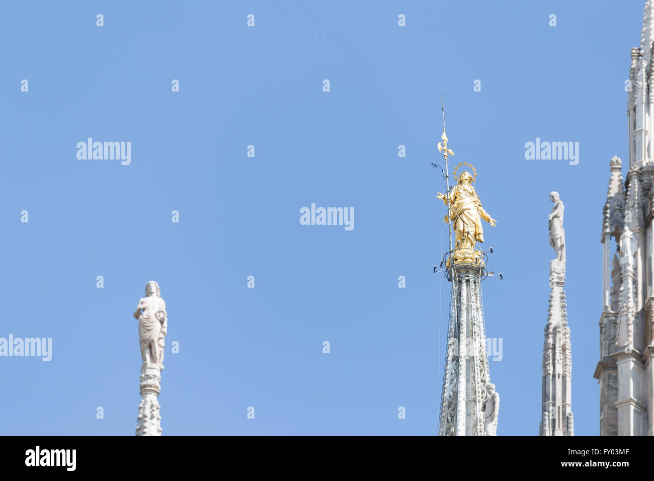 Golden Mary statue, Milan, Italy Stock Photo - Alamy