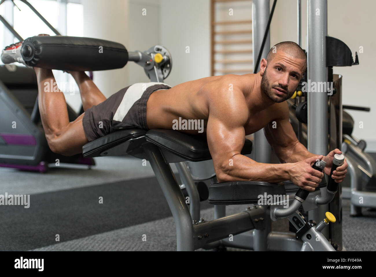 Lying leg curls hi-res stock photography and images - Alamy