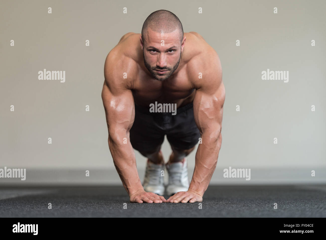 Healthy Athlete Doing Push Ups As Part Of Bodybuilding Training Stock ...