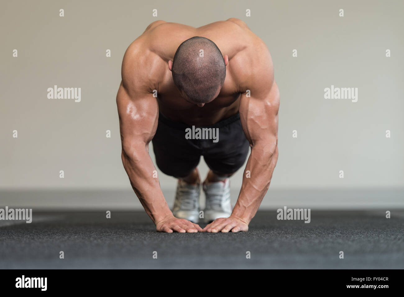 Healthy Athlete Doing Push Ups As Part Of Bodybuilding Training Stock ...