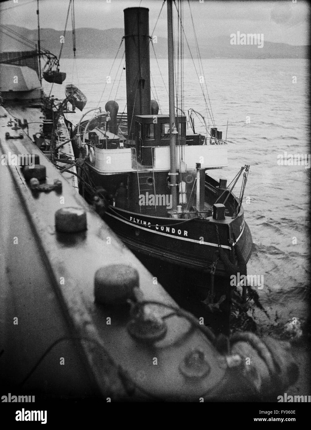 Tug boat and war ship hi-res stock photography and images - Alamy