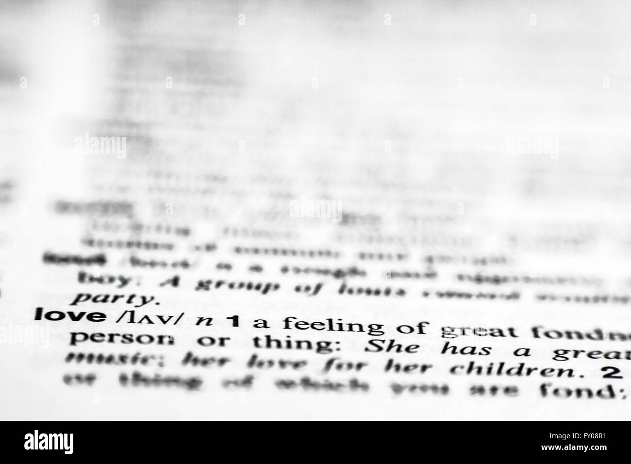 love description on a dictionary, focus to the word, blurred the rest ...