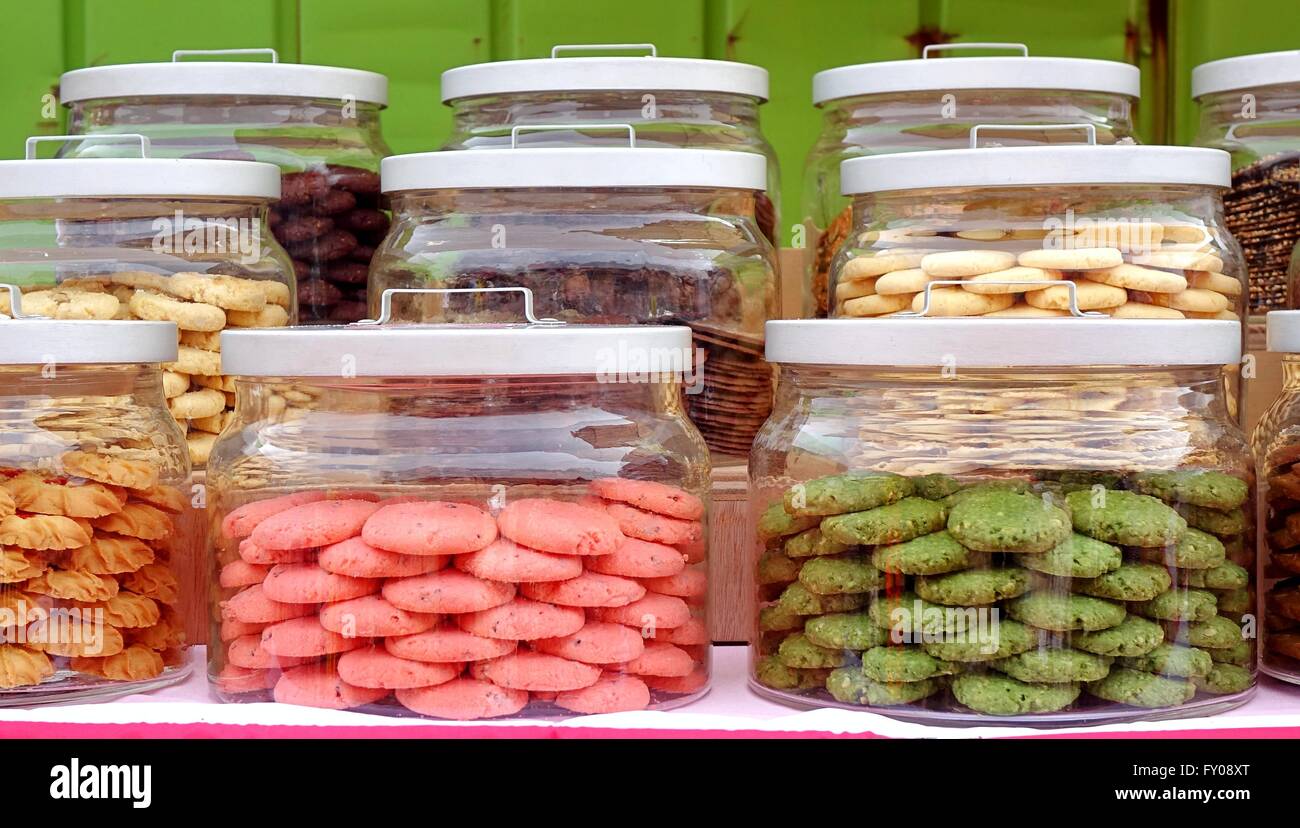 A colorful selection of cookies sold from large glass jars Stock Photo ...