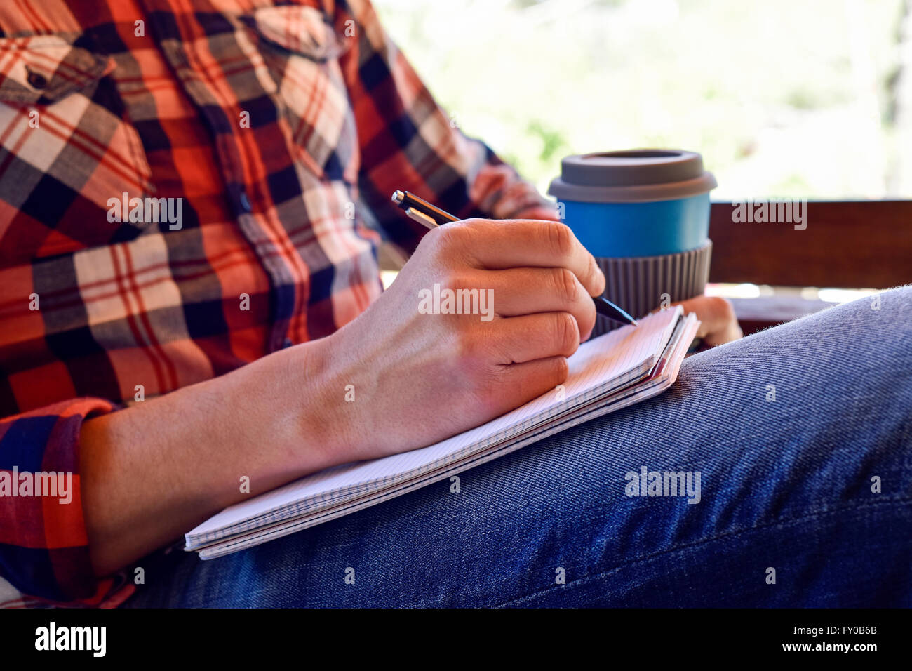 Young writer writing novel hi-res stock photography and images - Alamy