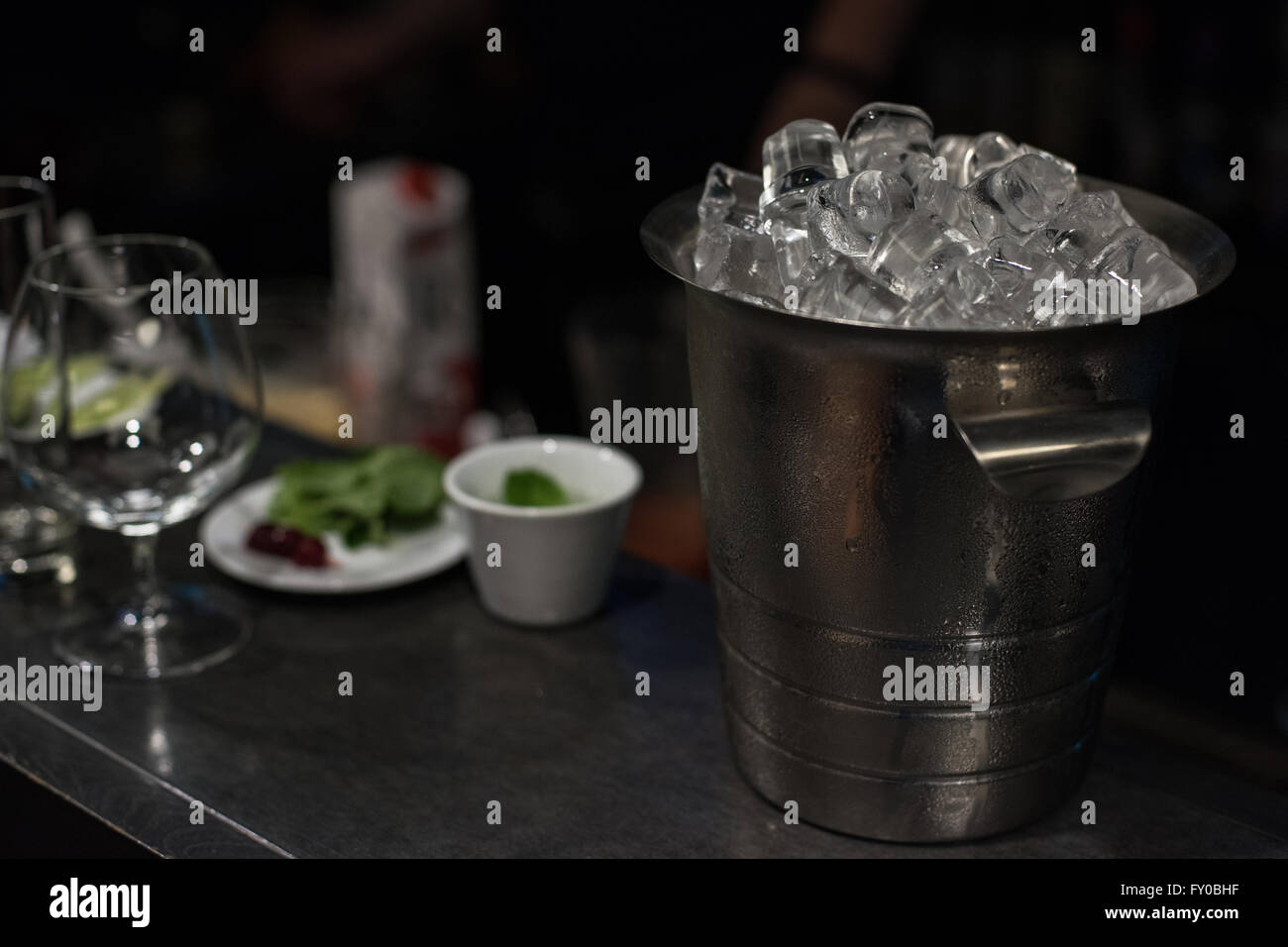 Ice bucket with ice cubes Stock Photo - Alamy