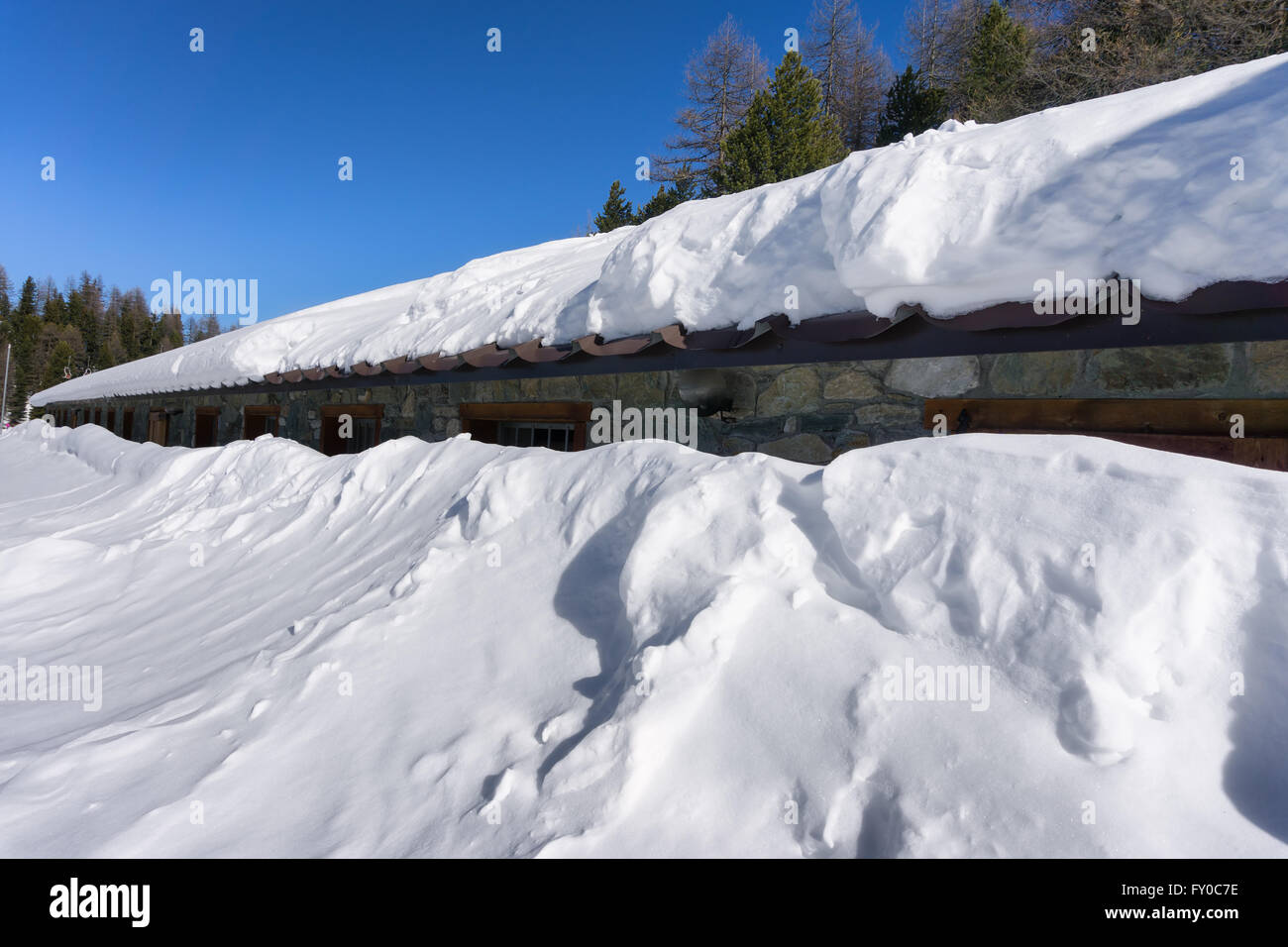 house covered and buried by snow Stock Photo - Alamy