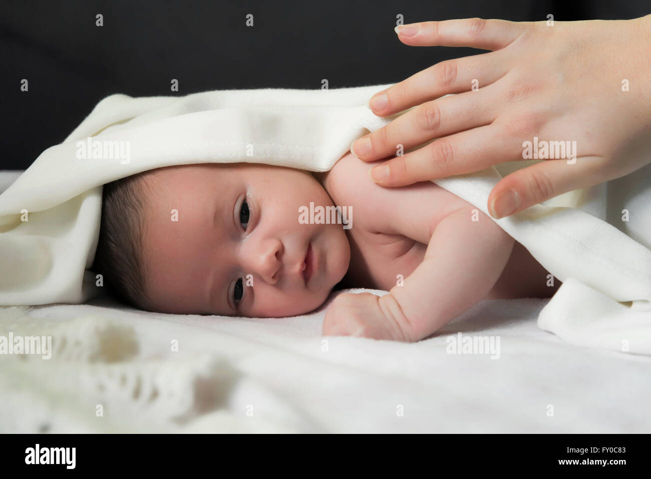 new born baby with mother hand Stock Photo - Alamy