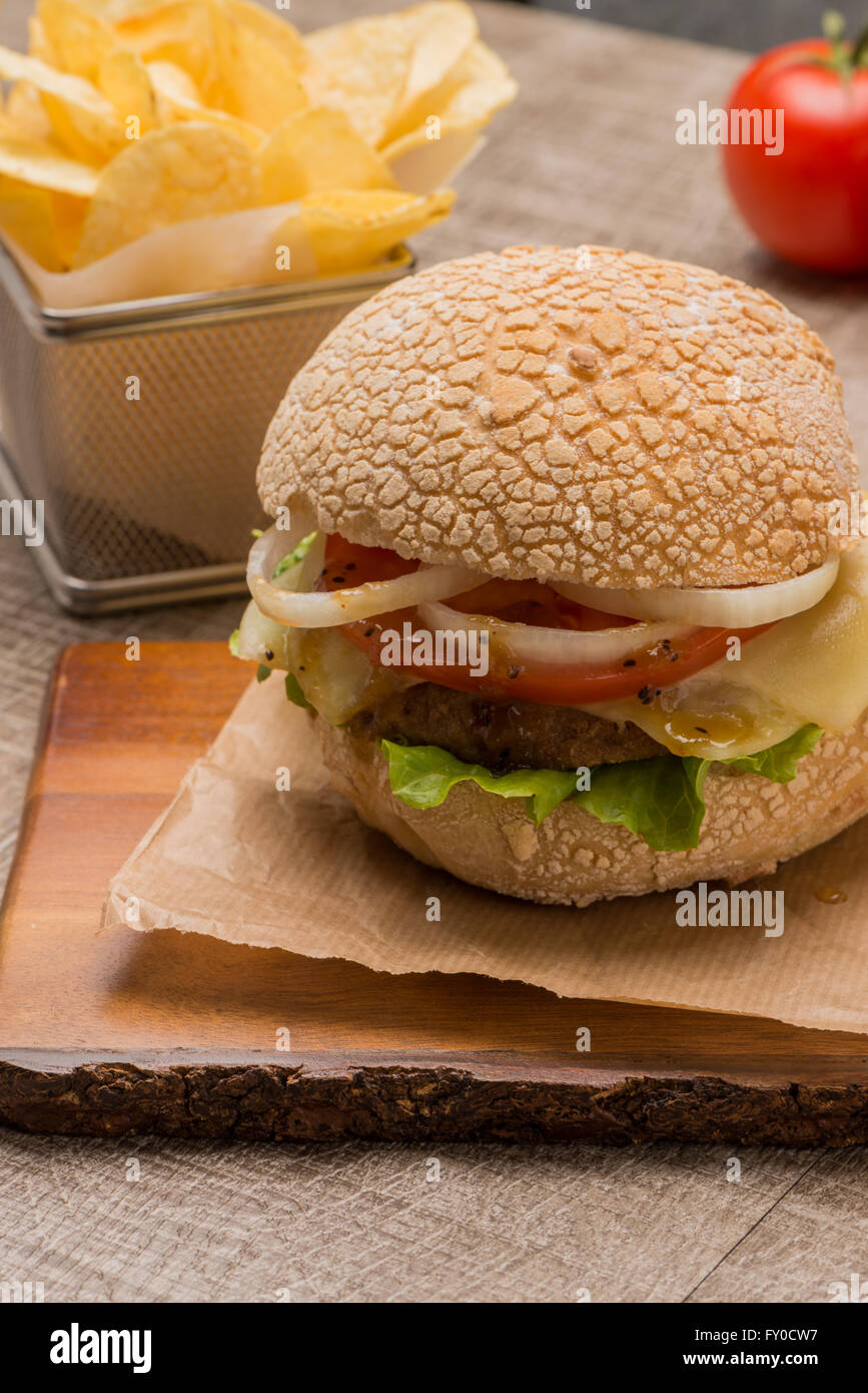Homemade veggie burger served on wooden table Stock Photo - Alamy