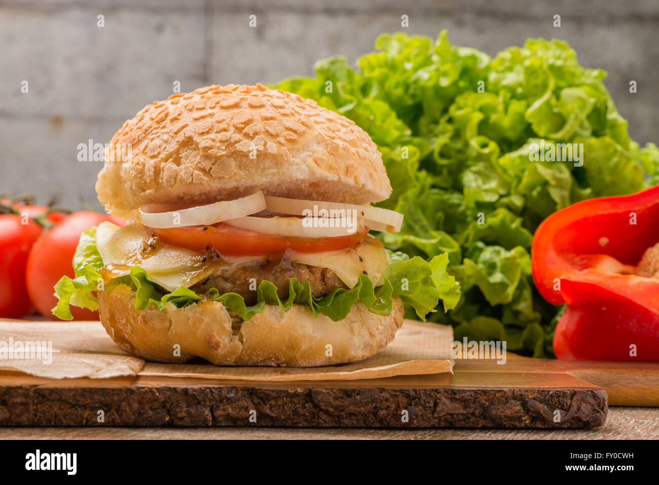 Homemade veggie burger served on wooden table Stock Photo - Alamy
