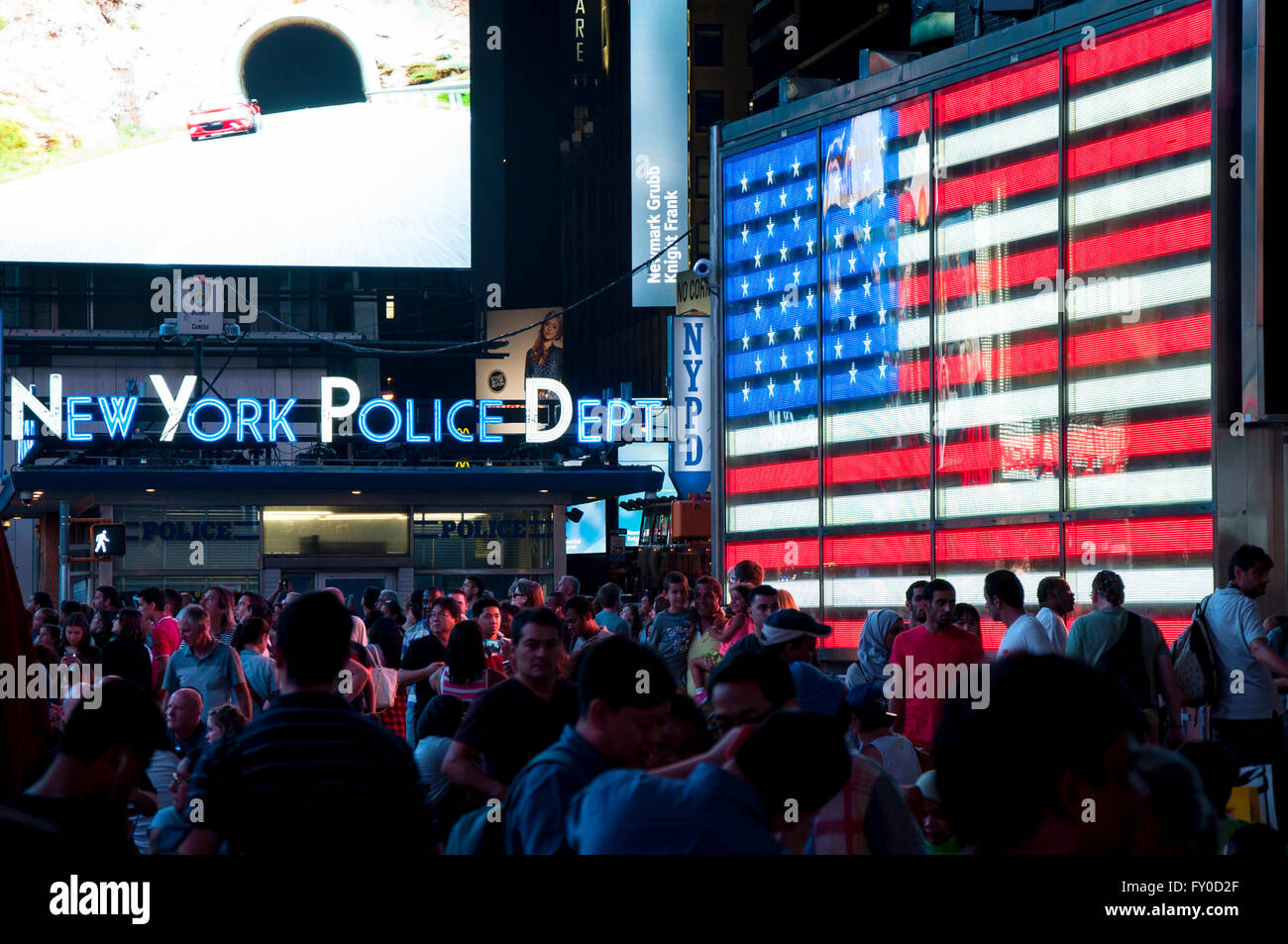 New York Police Department at night with Stars and Stripes. In Times ...