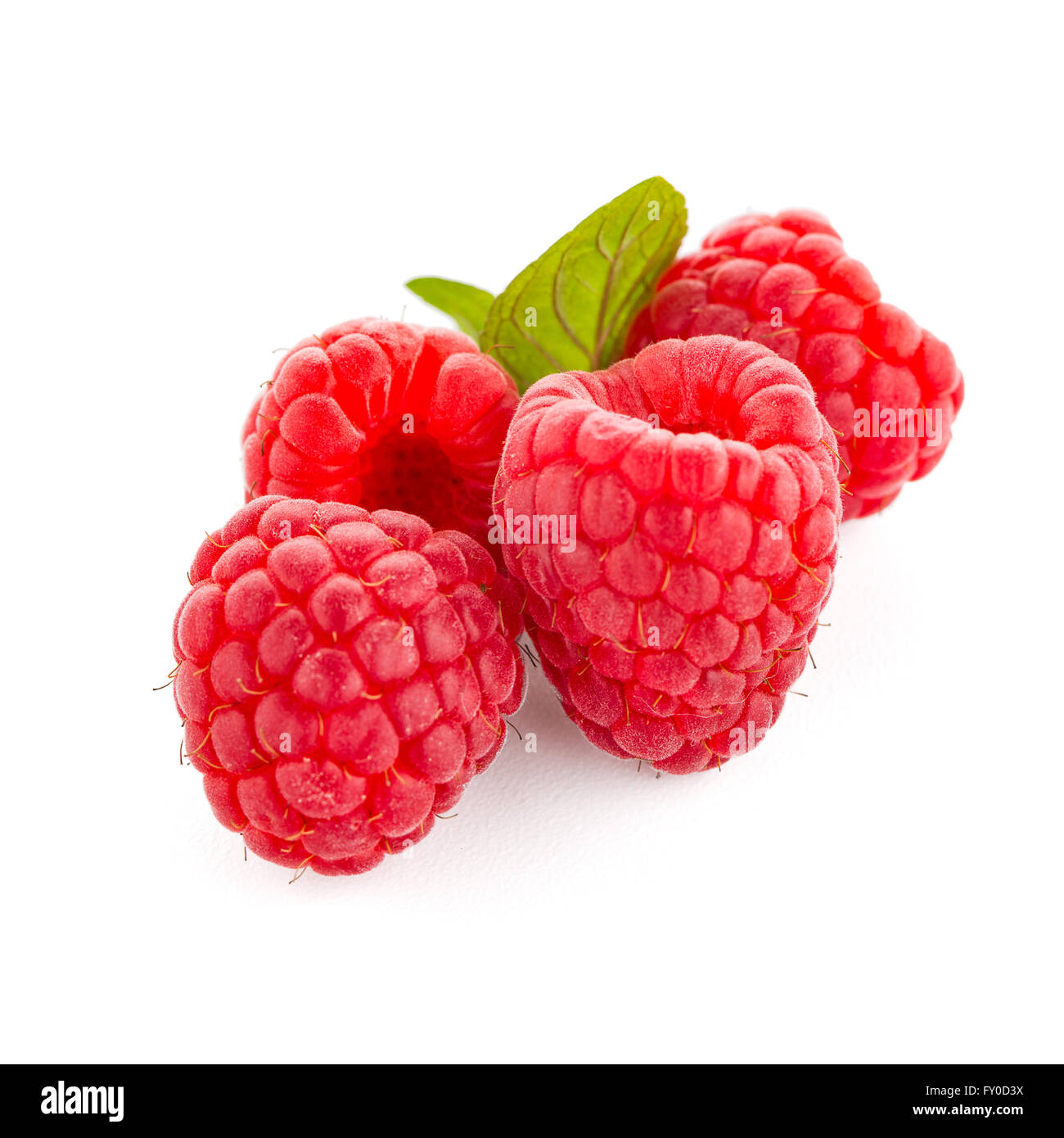 Raspberry fruit isolated over white background Stock Photo - Alamy