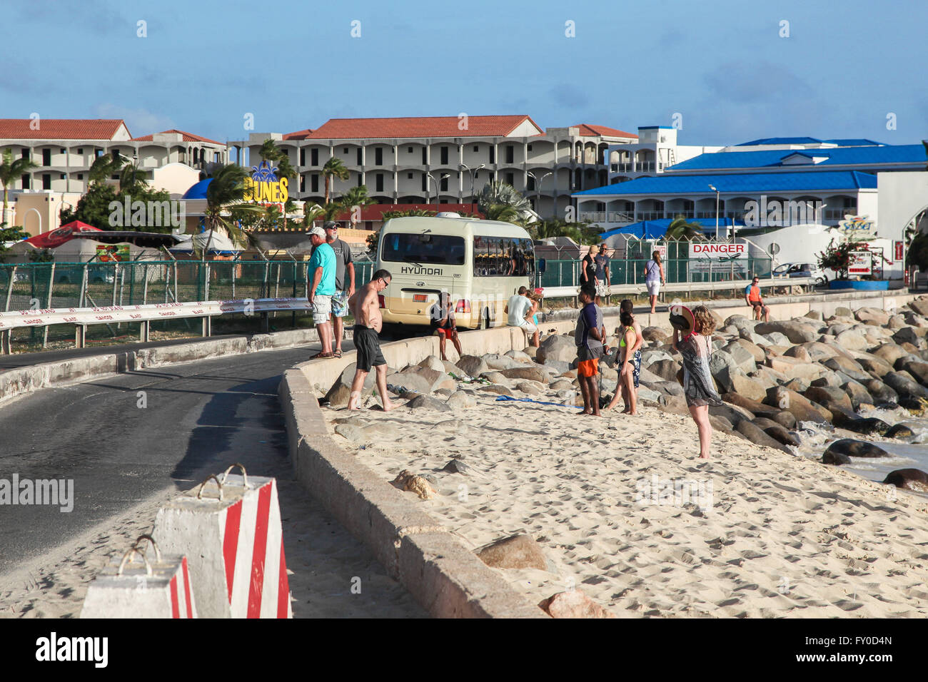 Famous Maho Bye Beach area with tourist waiting for aeroplane landig to ...